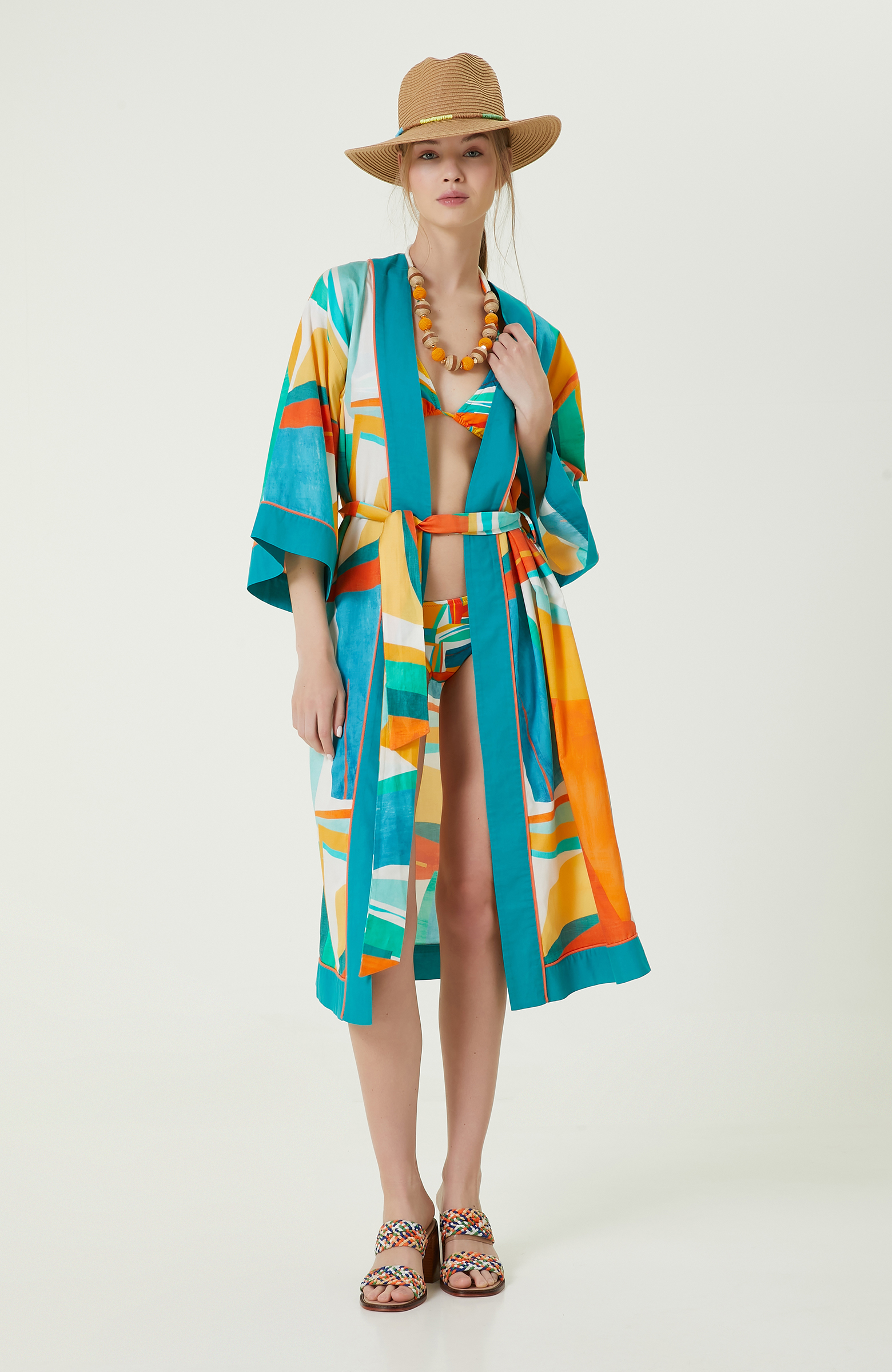 Turkuaz V Yaka Geometrik Desenli Kaftan Turkuaz V Yaka Geometrik Desenli Kaftan